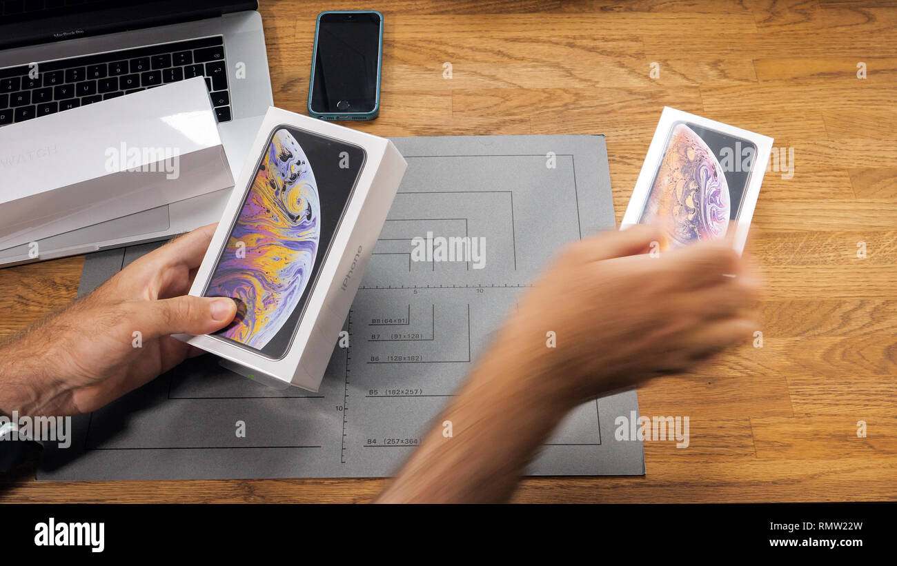 PARIS, FRANCE - SEPTEMBER 21, 2018: Apple fan boy unboxing latest new ...