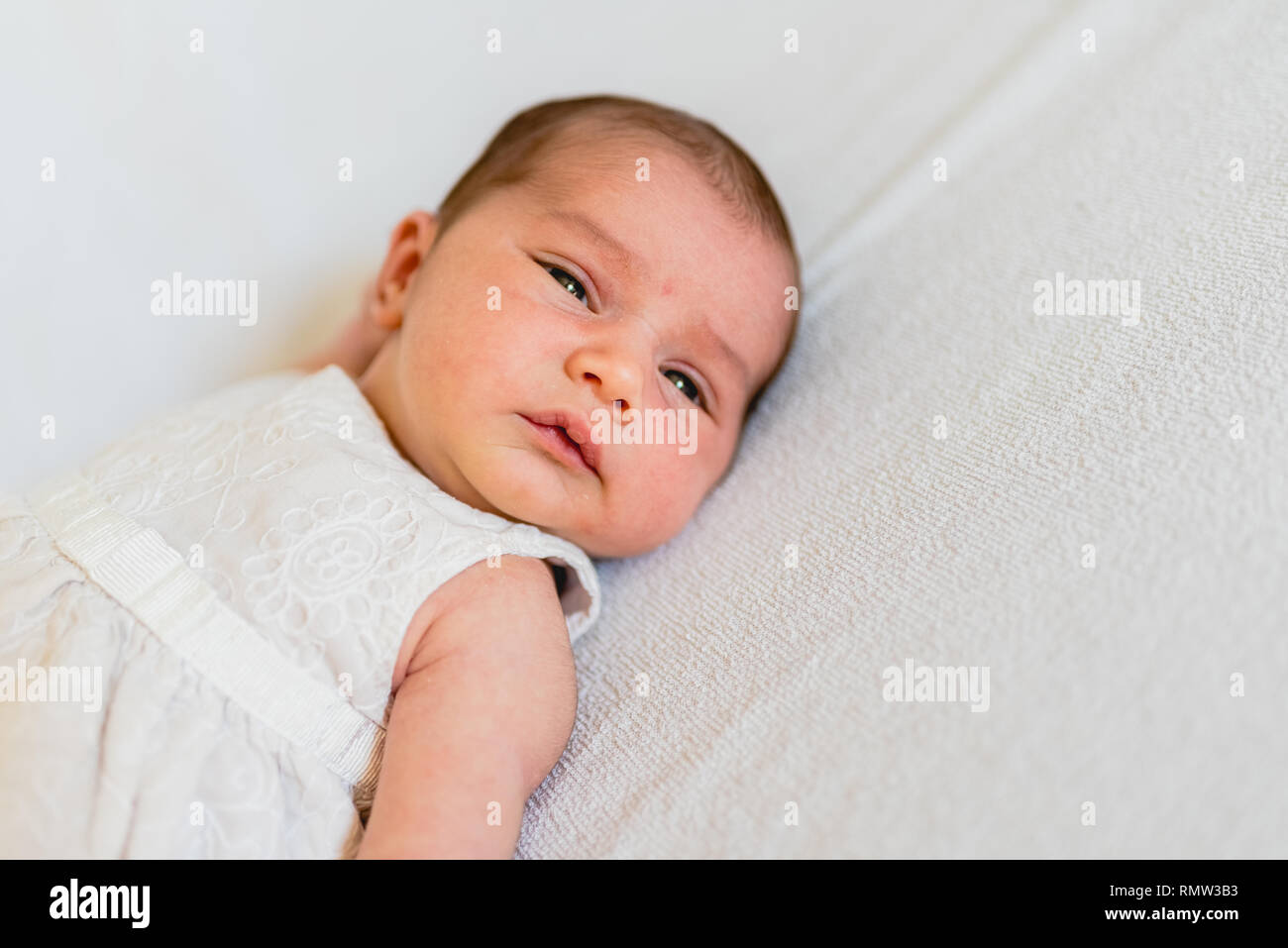 Portrait of tender and adorable 1-week-old baby Stock Photo - Alamy