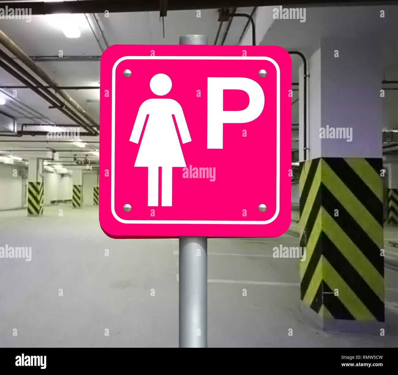 The pink sign for parking cars for women only inside public garage ...