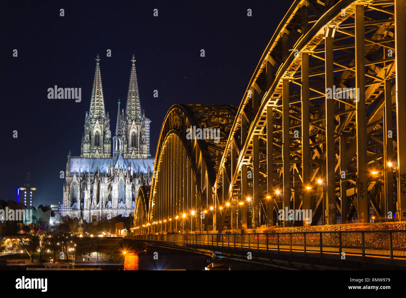Cologne skyline with Cologne Cathedral and Hohenzollern bridge at night ...