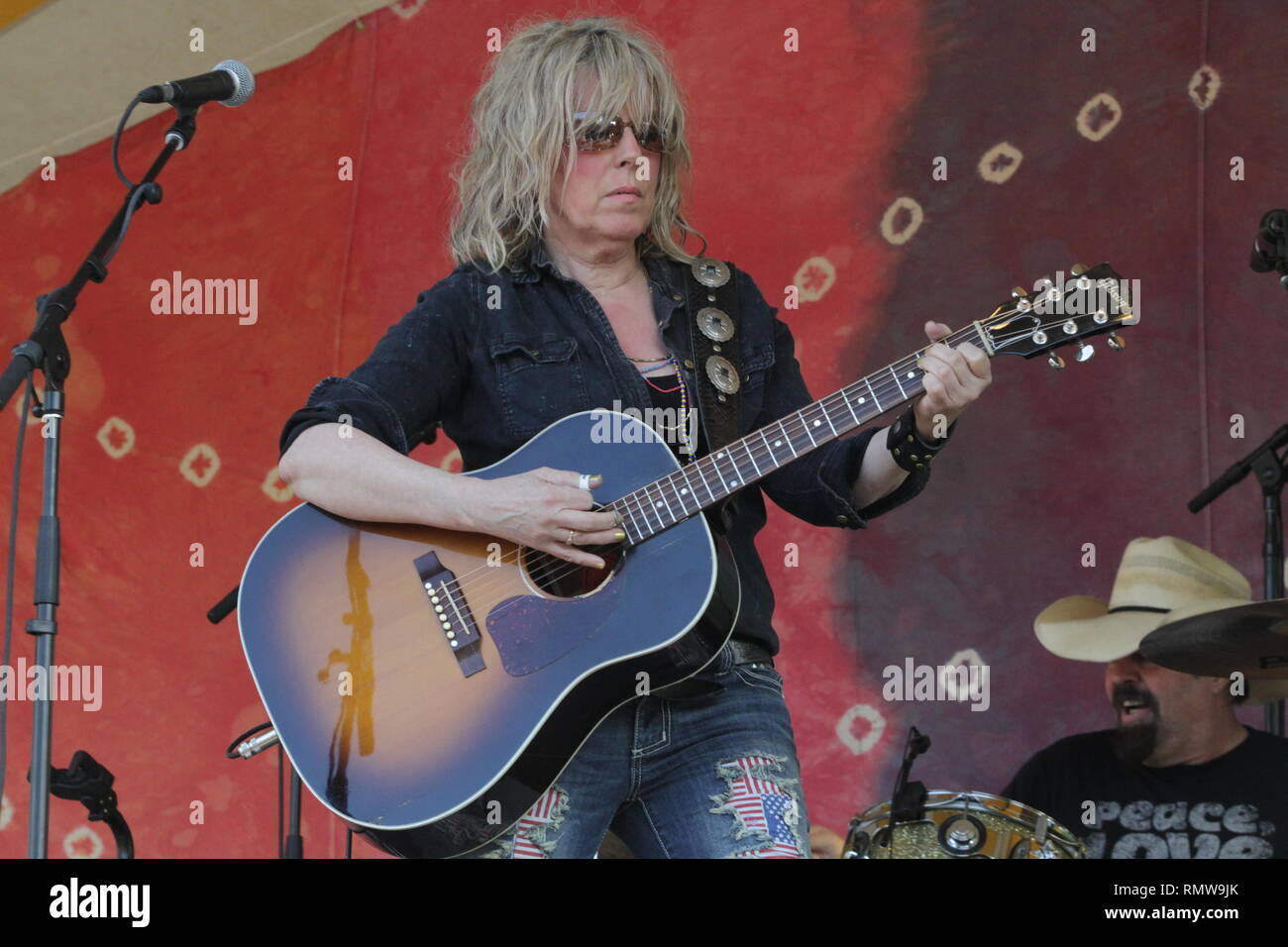 Singer, songwriter and guitarist Lucinda Williams is shown performing ...