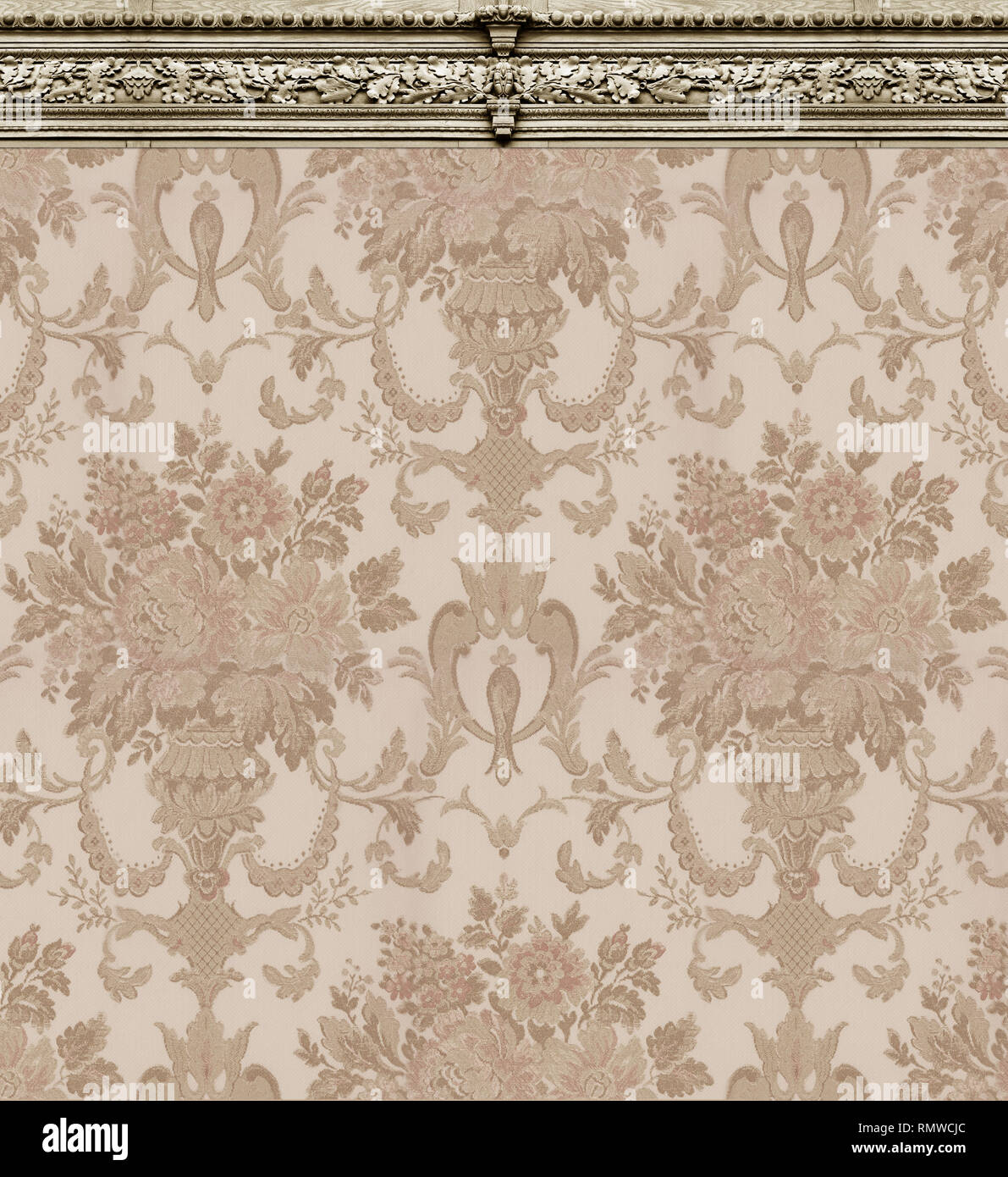 Elegant wall with rich tan damask wallpaper Stock Photo - Alamy