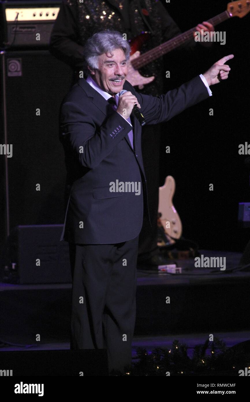 Singer and entertainer Tony Orlando is shown performing on stage during ...
