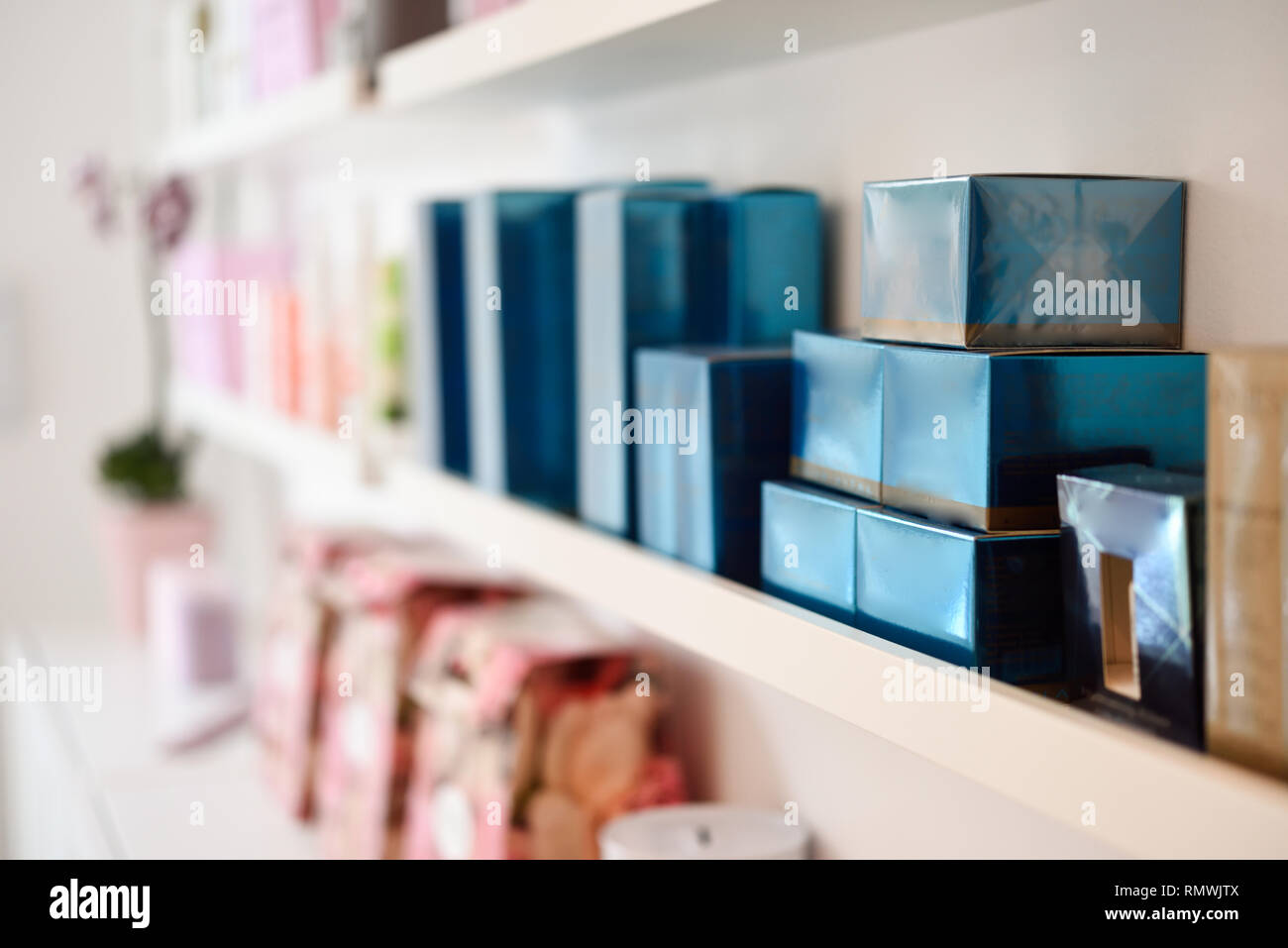 Cosmetic section with facial cream in beauty salon Stock Photo - Alamy