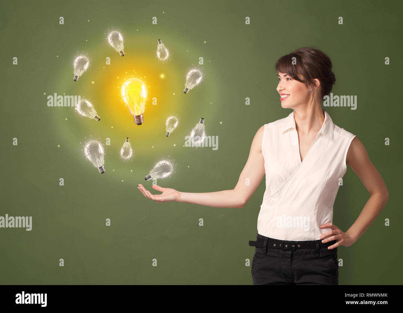 Young smiling person presenting new idea concept Stock Photo - Alamy