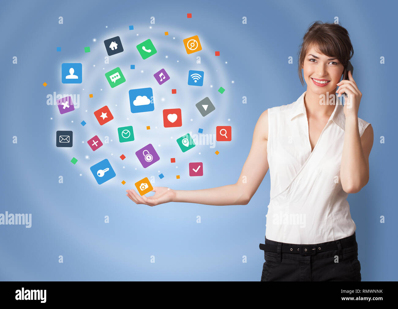 Young person presenting new application icons and symbols Stock Photo ...