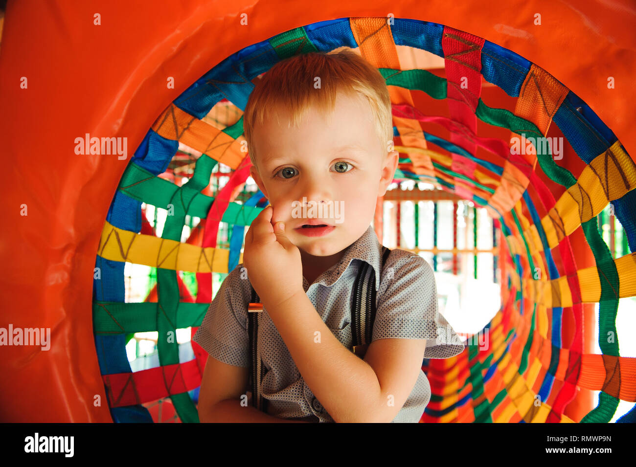 A modern children playground indoor. Boy have fun Stock Photo - Alamy