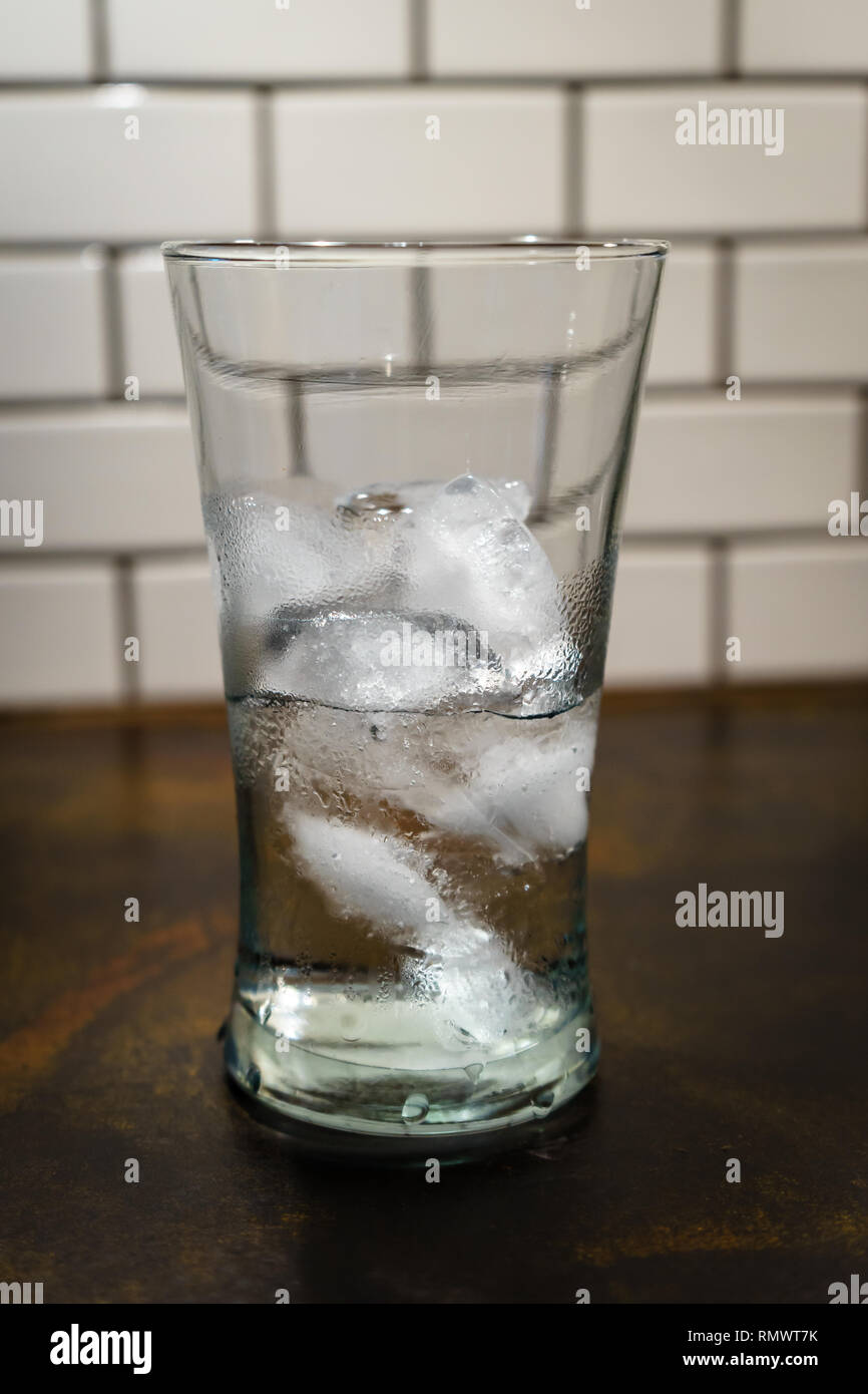 Melting Ice in Glass Stock Photo - Alamy