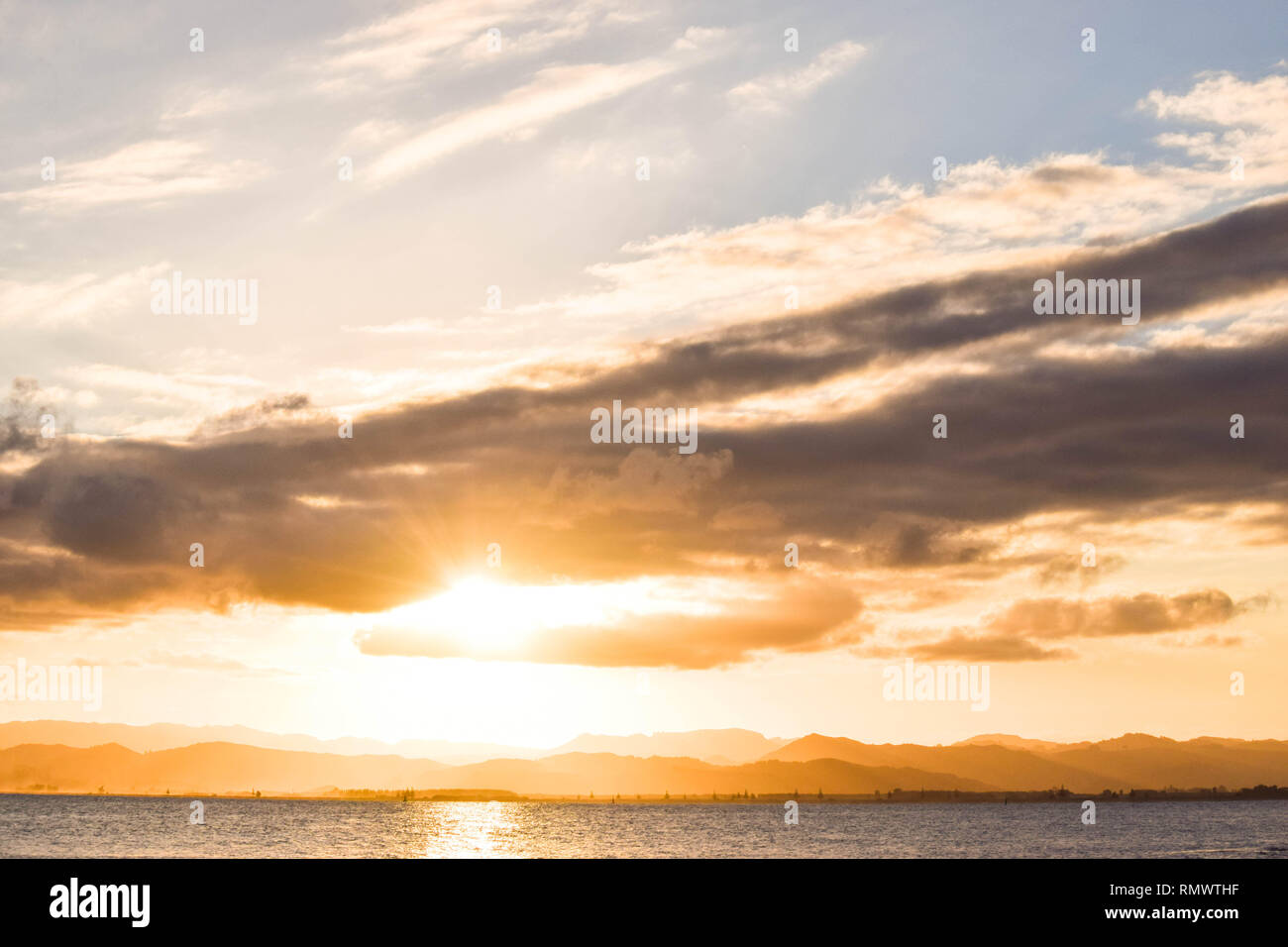 Blue sky with clouds start of sunset hi-res stock photography and ...