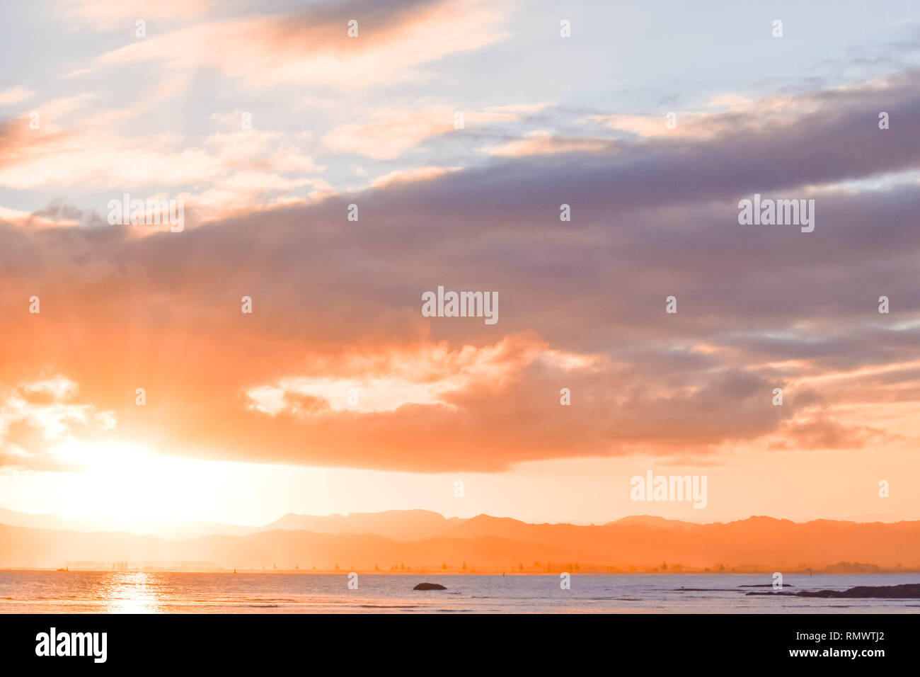 Peach colored clouds hi-res stock photography and images - Alamy
