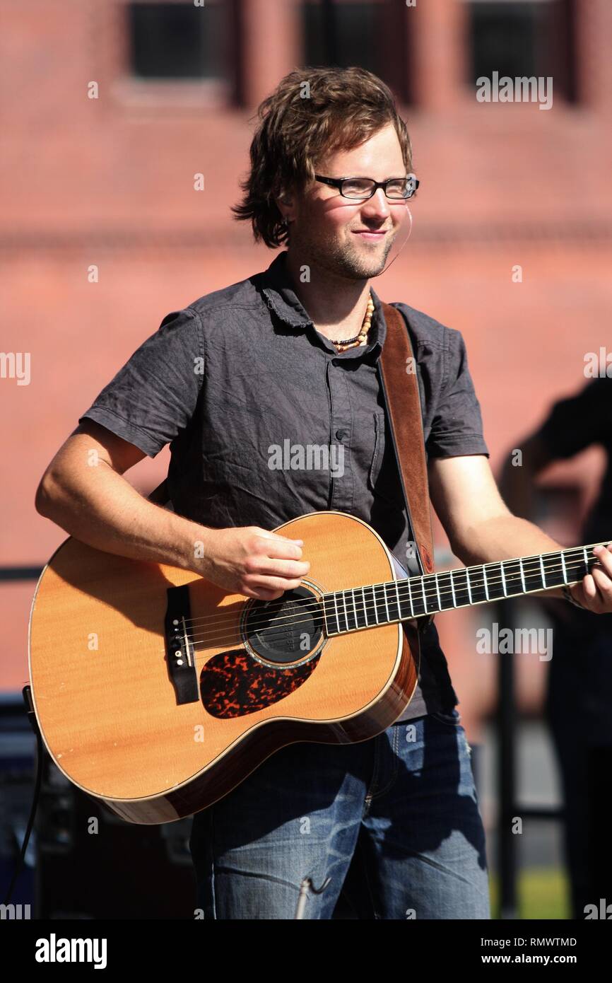 Enter the Haggis band guitarist Trevor Lewington is shown performing on ...