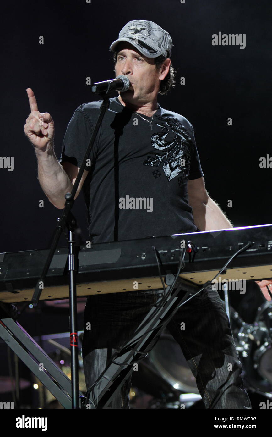 Ernie & the Automatics band member is shown performing on stage during ...