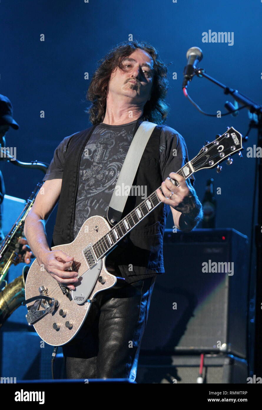 Ernie & the Automatics band member is shown performing on stage during ...