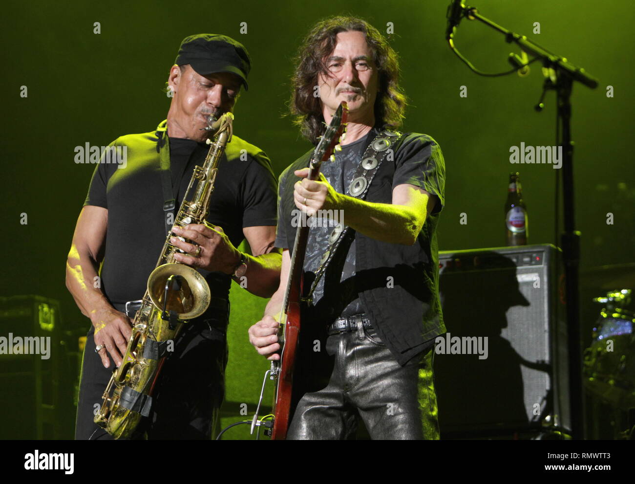Ernie & the Automatics band member is shown performing on stage during ...