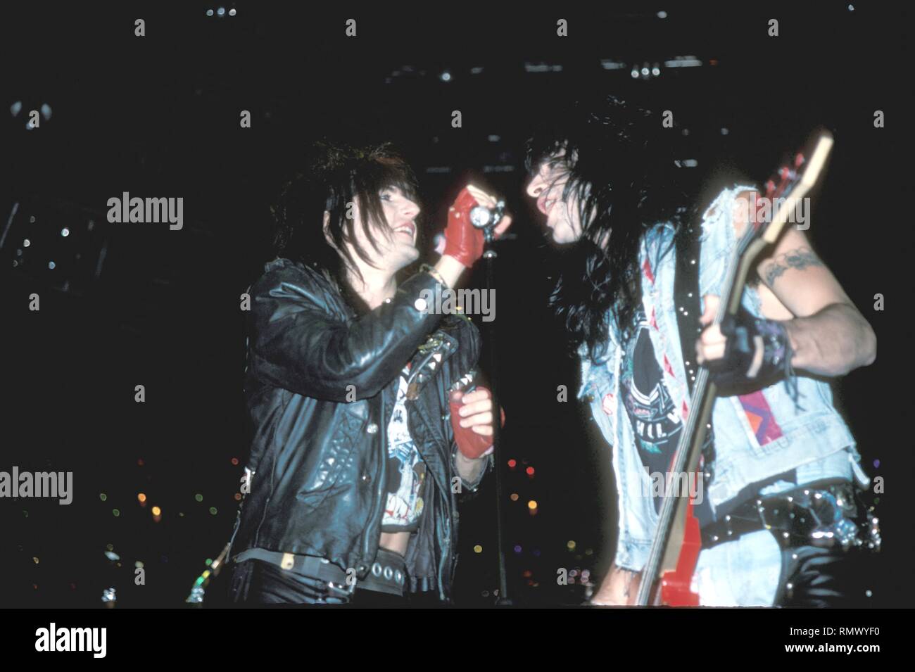 The singer and bassist for hard rock band LA Guns are shown performing ...