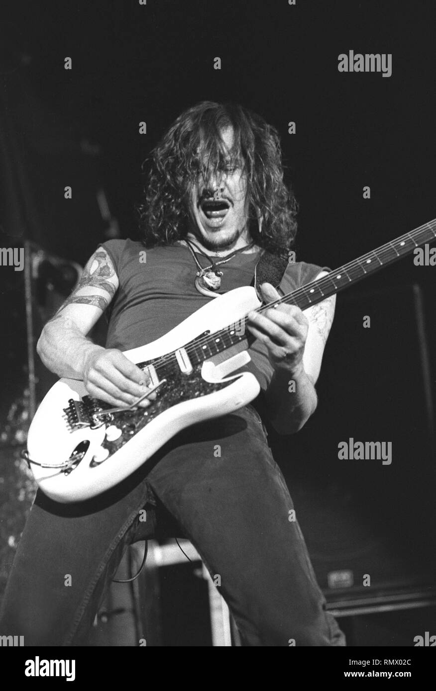 Guitarist of the hard rock band Little Ceasar is shown performing on ...