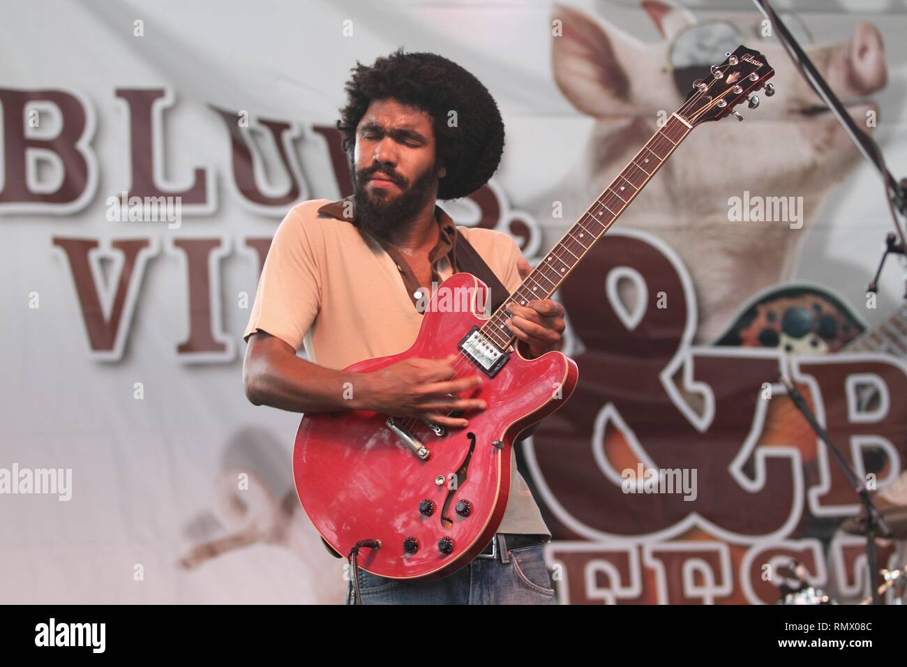 Guitarist and singer Tash Neal is shown performing on stage during a ...