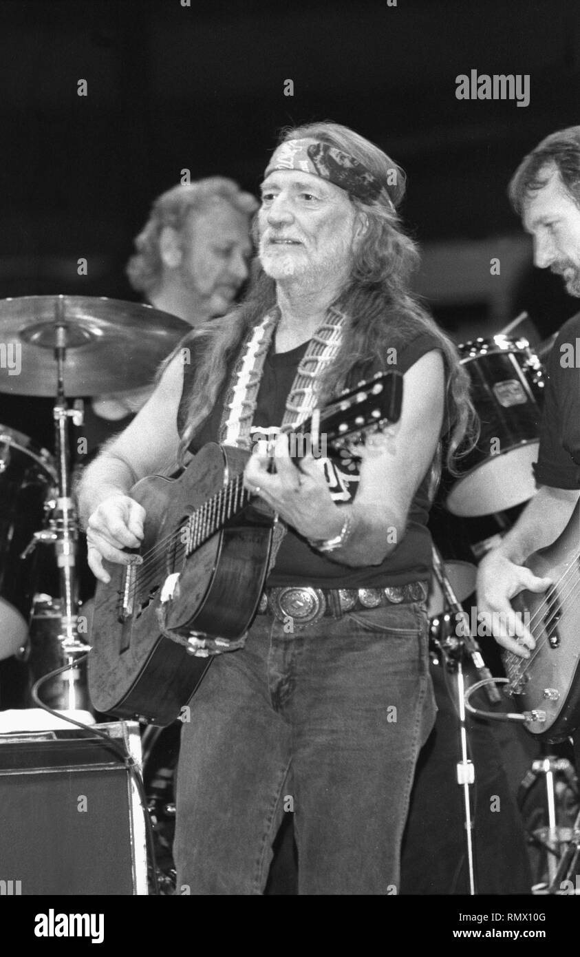 Country music star Willie Nelson is shown performing on stage during a ...