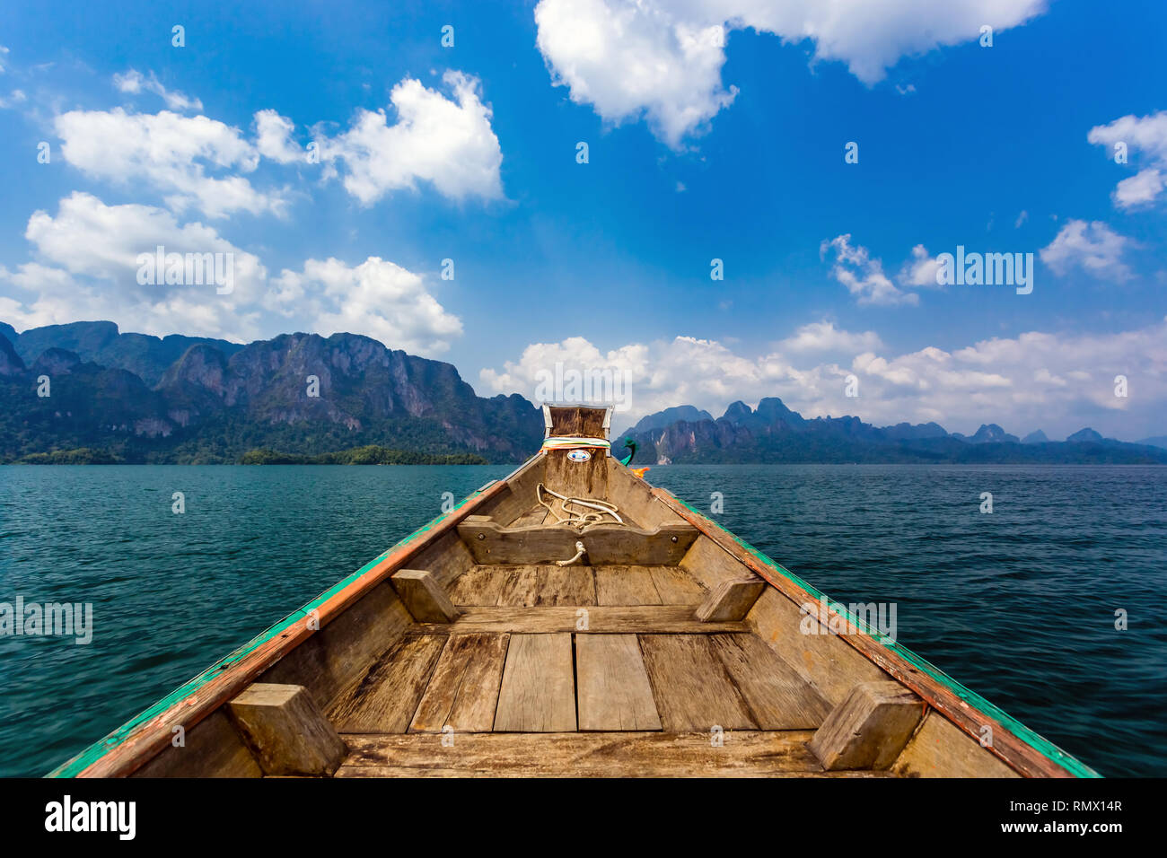 Wooden Thai traditional long-tail boat at Khao Sok National Park, Cheow ...