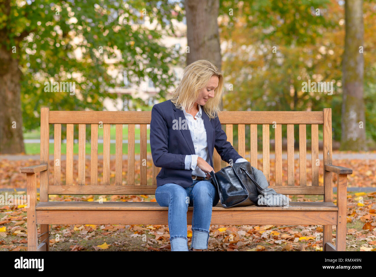 Rummaging in bag hi-res stock photography and images - Alamy