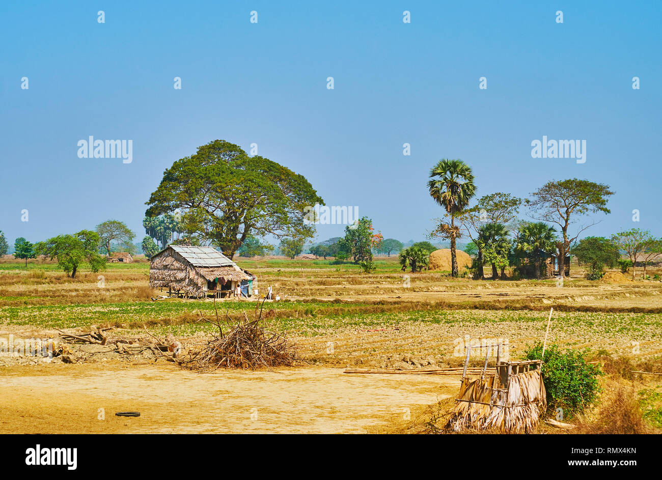 The scenic rural landscape with shabby shanties of Yangon suburb ...