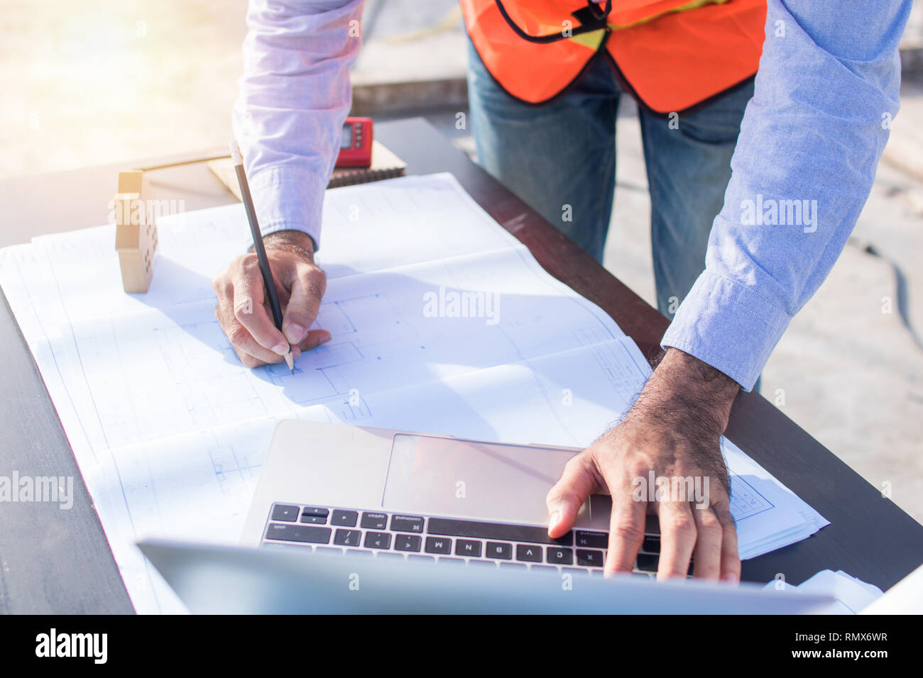 engineer planing and working on table in construction working site ...