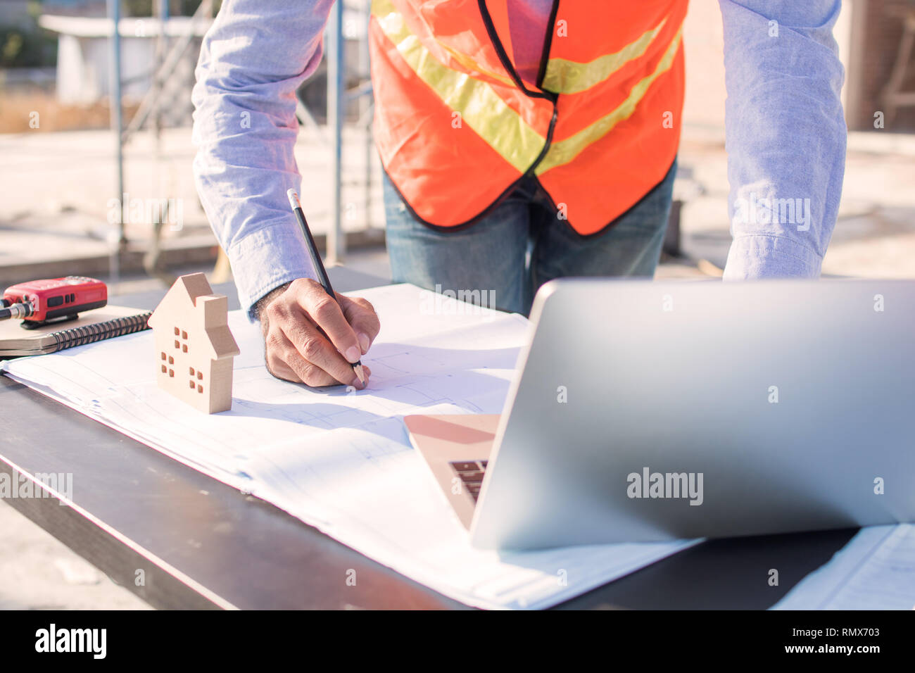 engineer planing and working on table in construction working site ...