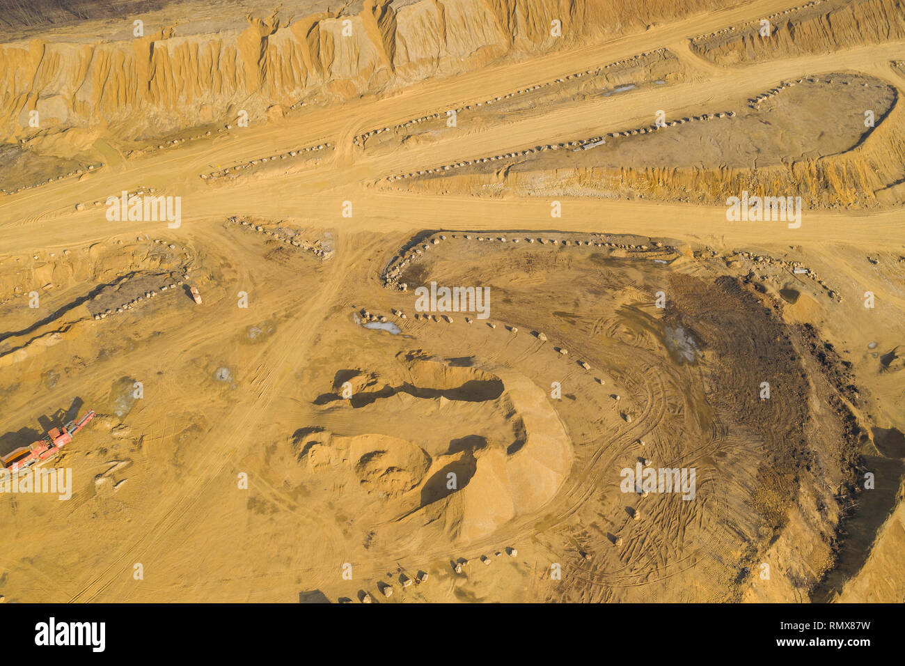 Aerial view of sandpit and factory plant producing sand materials for ...