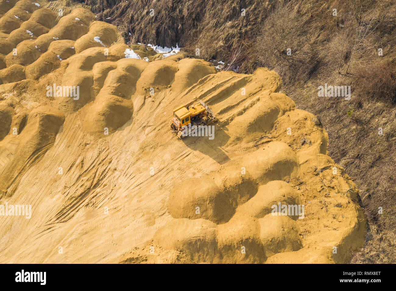 Aerial view of sandpit and factory plant producing sand materials for ...