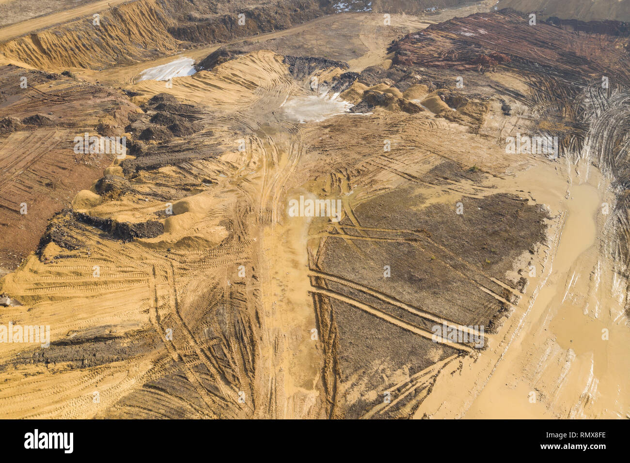 Aerial view of sandpit and factory plant producing sand materials for ...
