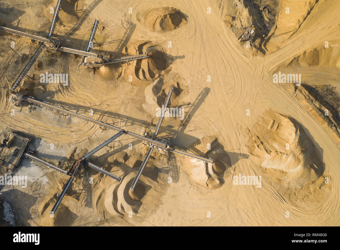 Aerial view of sandpit and factory plant producing sand materials for ...
