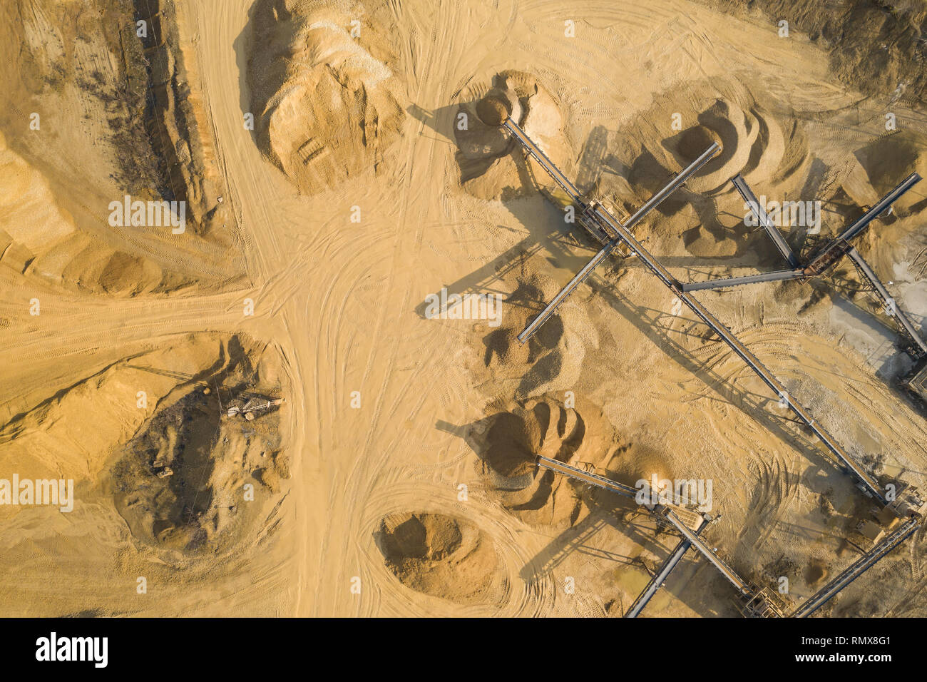 Aerial view of sandpit and factory plant producing sand materials for ...