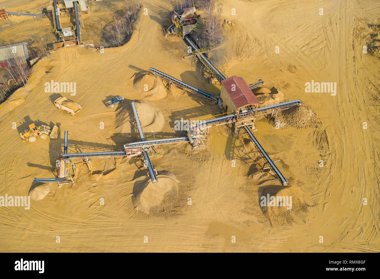 Aerial view of sandpit and factory plant producing sand materials for ...