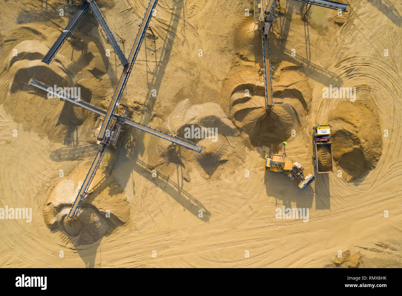 Aerial view of sandpit and factory plant producing sand materials for ...