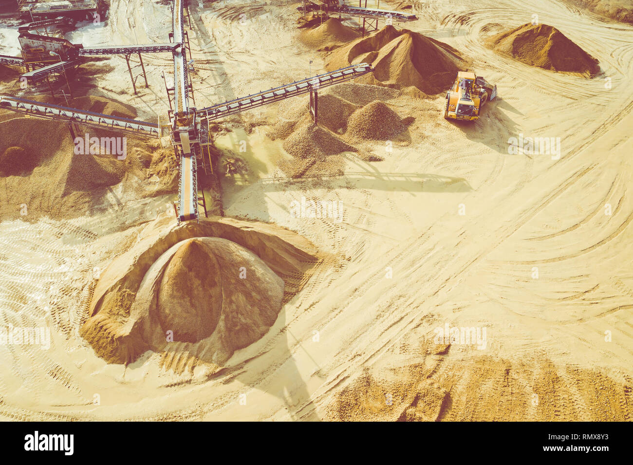 Aerial view of sandpit and factory plant producing sand materials for ...
