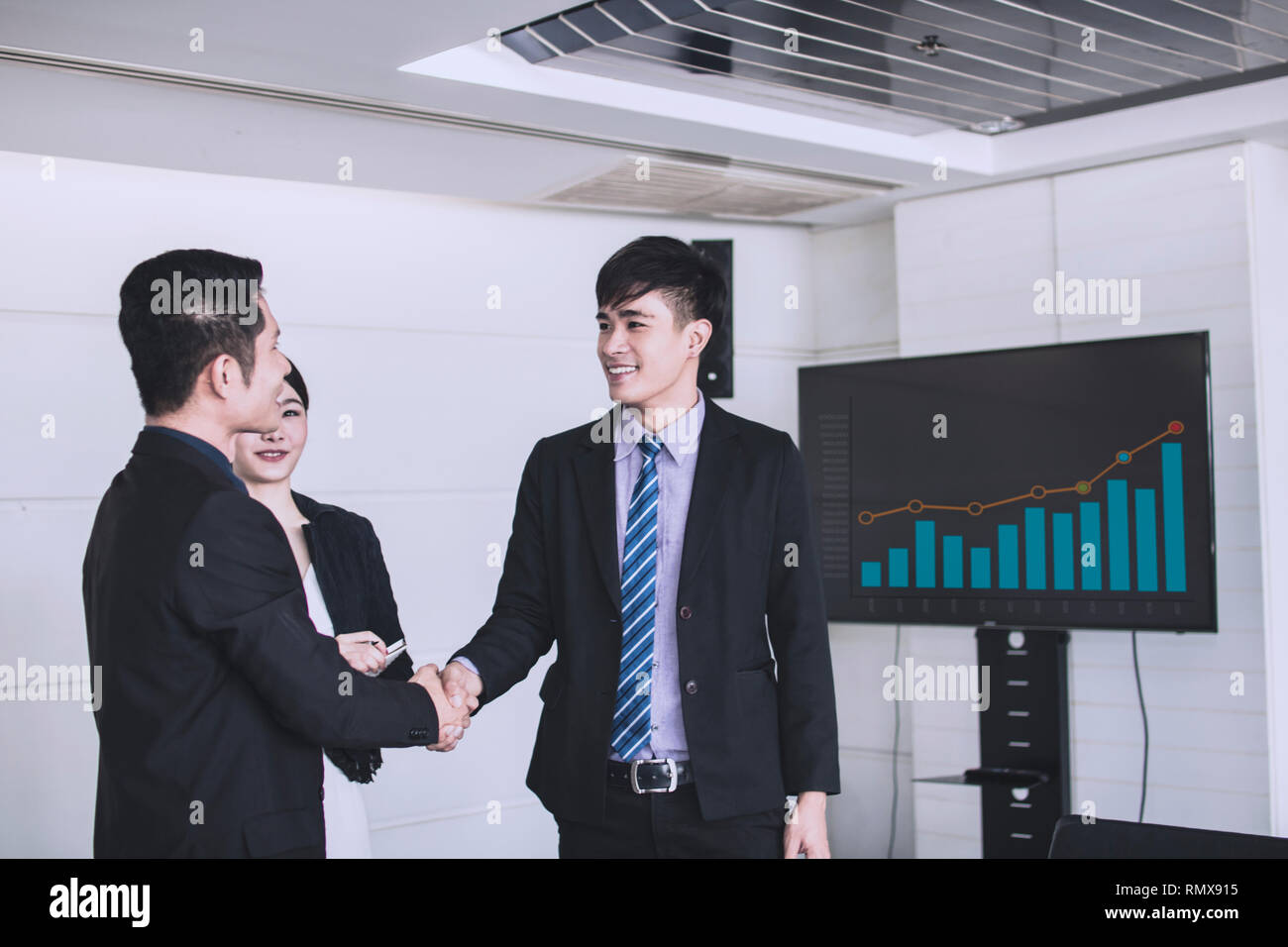 successful business people shake hand with partner and investor Stock ...