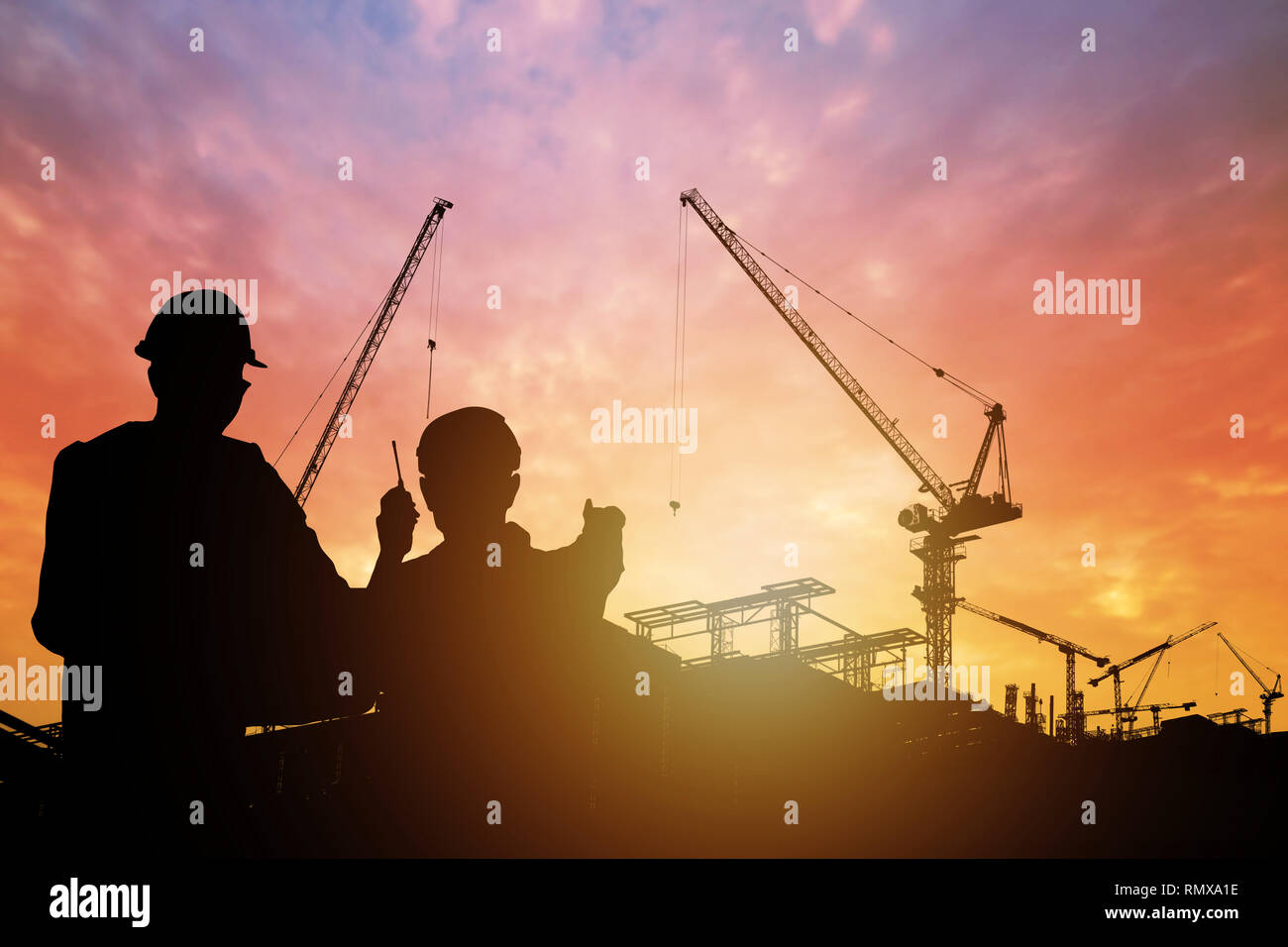 silhouette of engineers with worker in construction building Stock ...