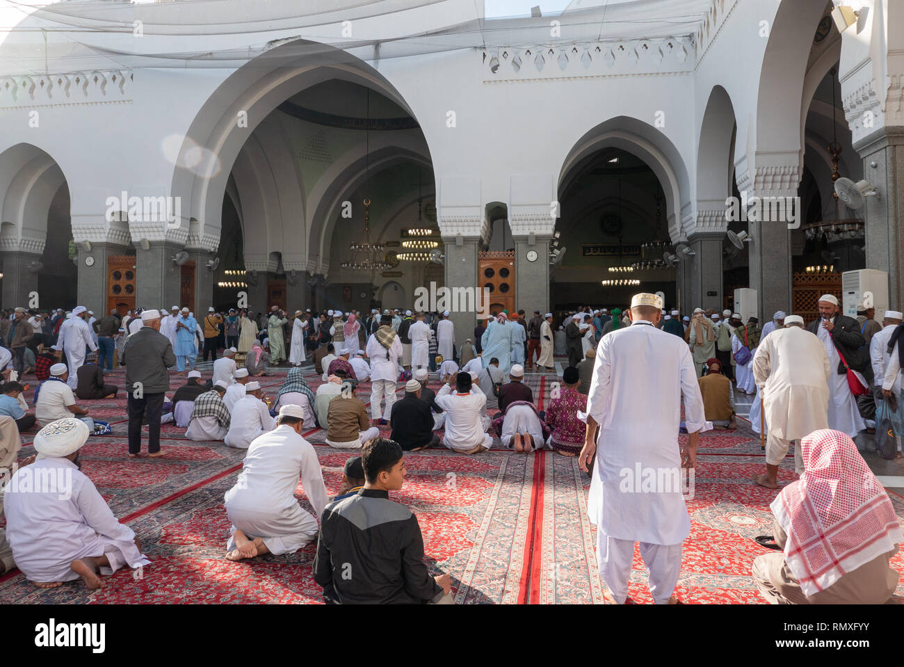 MEDINA, SAUDI ARABIA-CIRCA 2016 : Pilgrims pray inside Quba mosque in ...