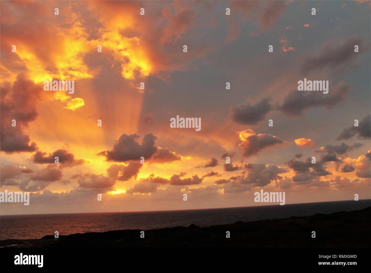 Sunset colors over sea hi-res stock photography and images - Alamy