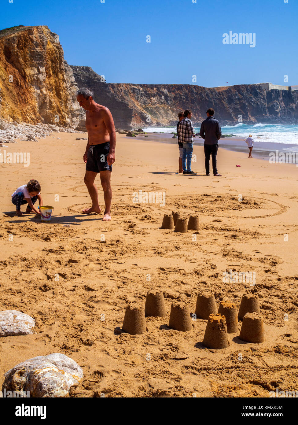 Sunbakers at Praia do Tonel in Sagres in southern Portugal Stock Photo ...