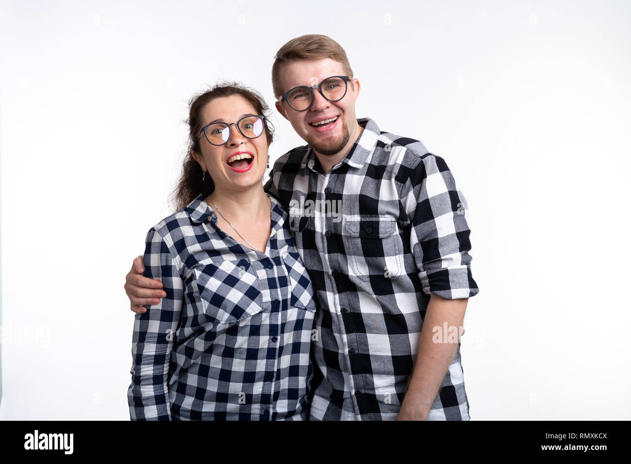 People, geek and education concept - Two students with funny faces over ...