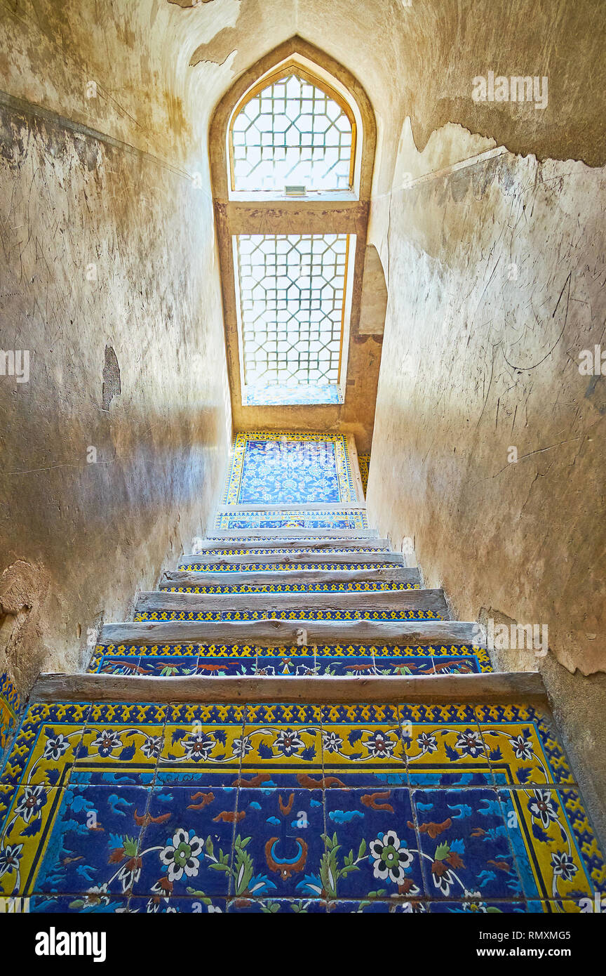 ISFAHAN, IRAN - OCTOBER 21, 2017: Preserved decorative tile floor in ...