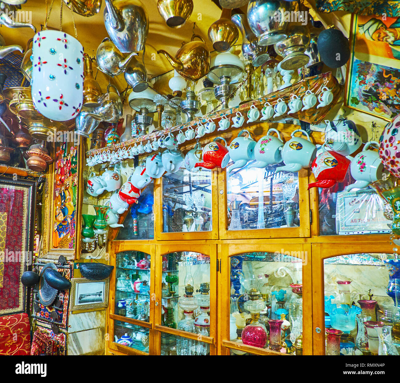 ISFAHAN, IRAN - OCTOBER 21, 2017: The glass door buffet with kerosene ...