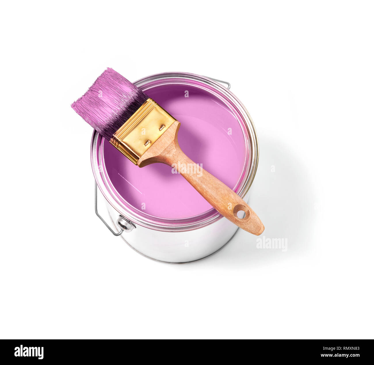 Pink paint tin can with brush on top on a white background with big ...