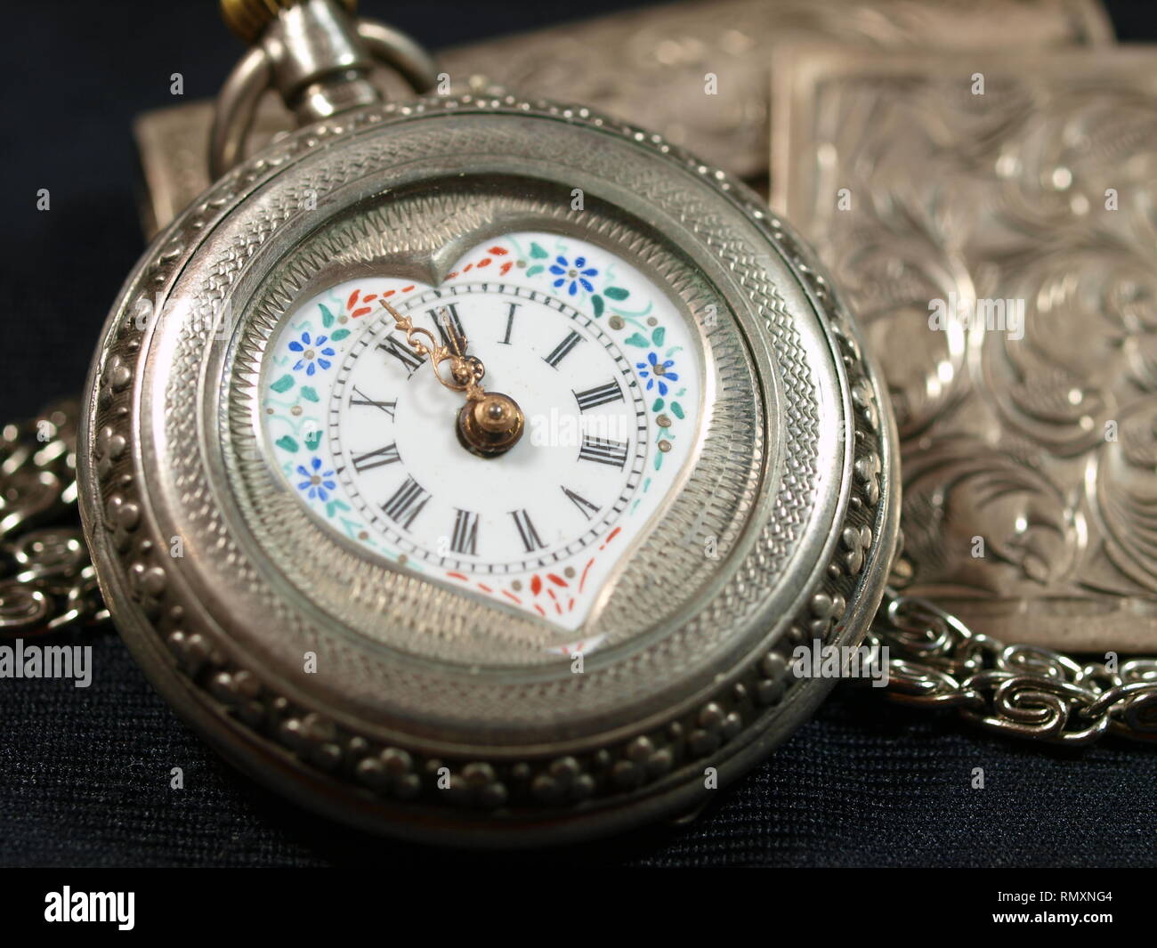 Antique silver watches with painted porcelain face Stock Photo - Alamy