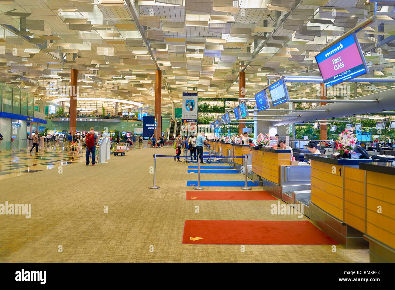 SINGAPORE - CIRCA AUGUST, 2016: check-in counters at Changi Aiport ...