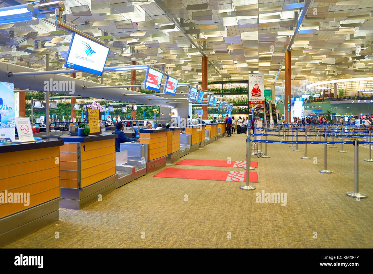 SINGAPORE - CIRCA AUGUST, 2016: check-in counters at Changi Aiport ...
