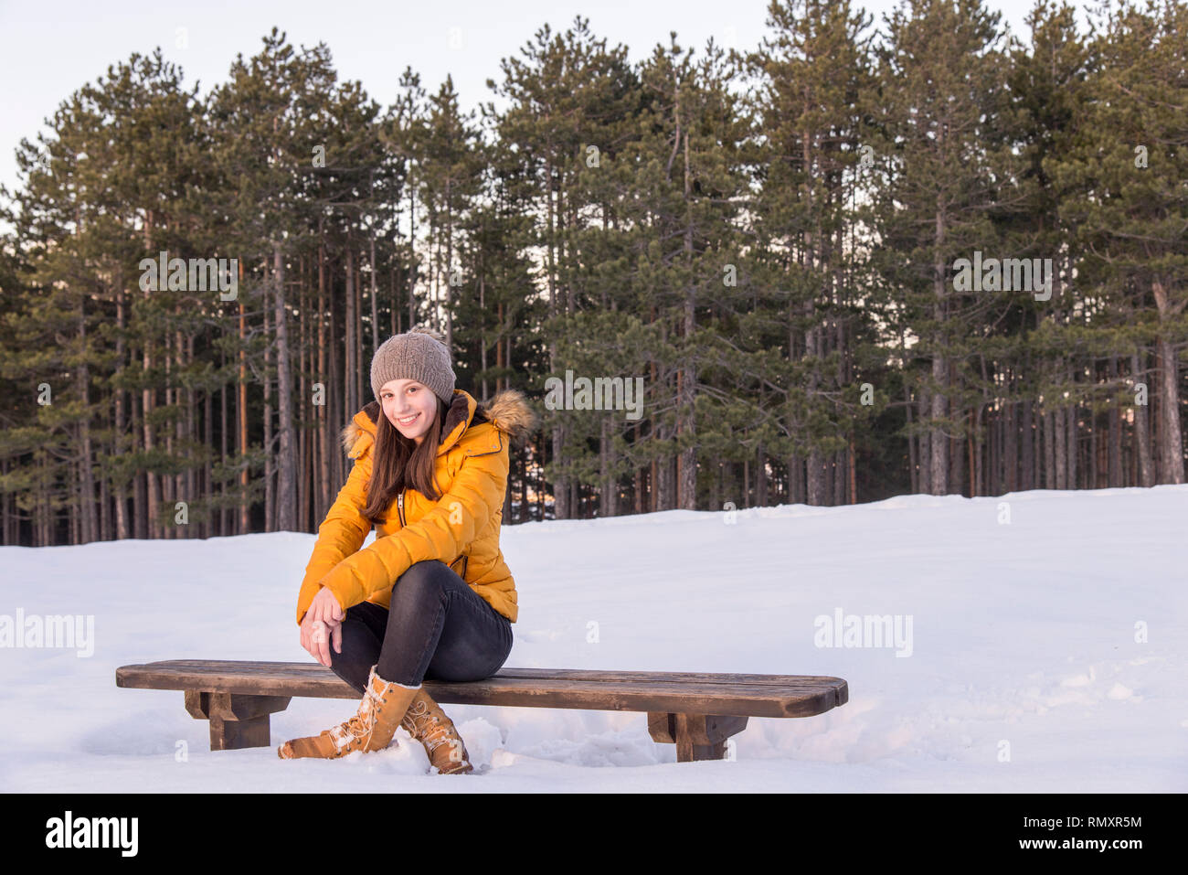 Beautiful girl modeling on snow Stock Photo - Alamy