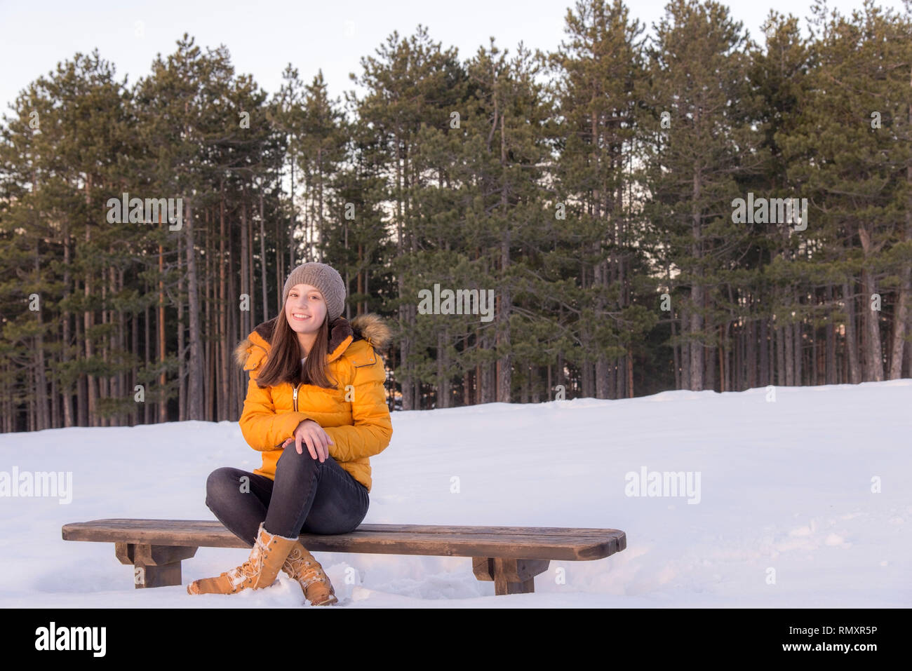 Beautiful girl modeling on snow Stock Photo - Alamy
