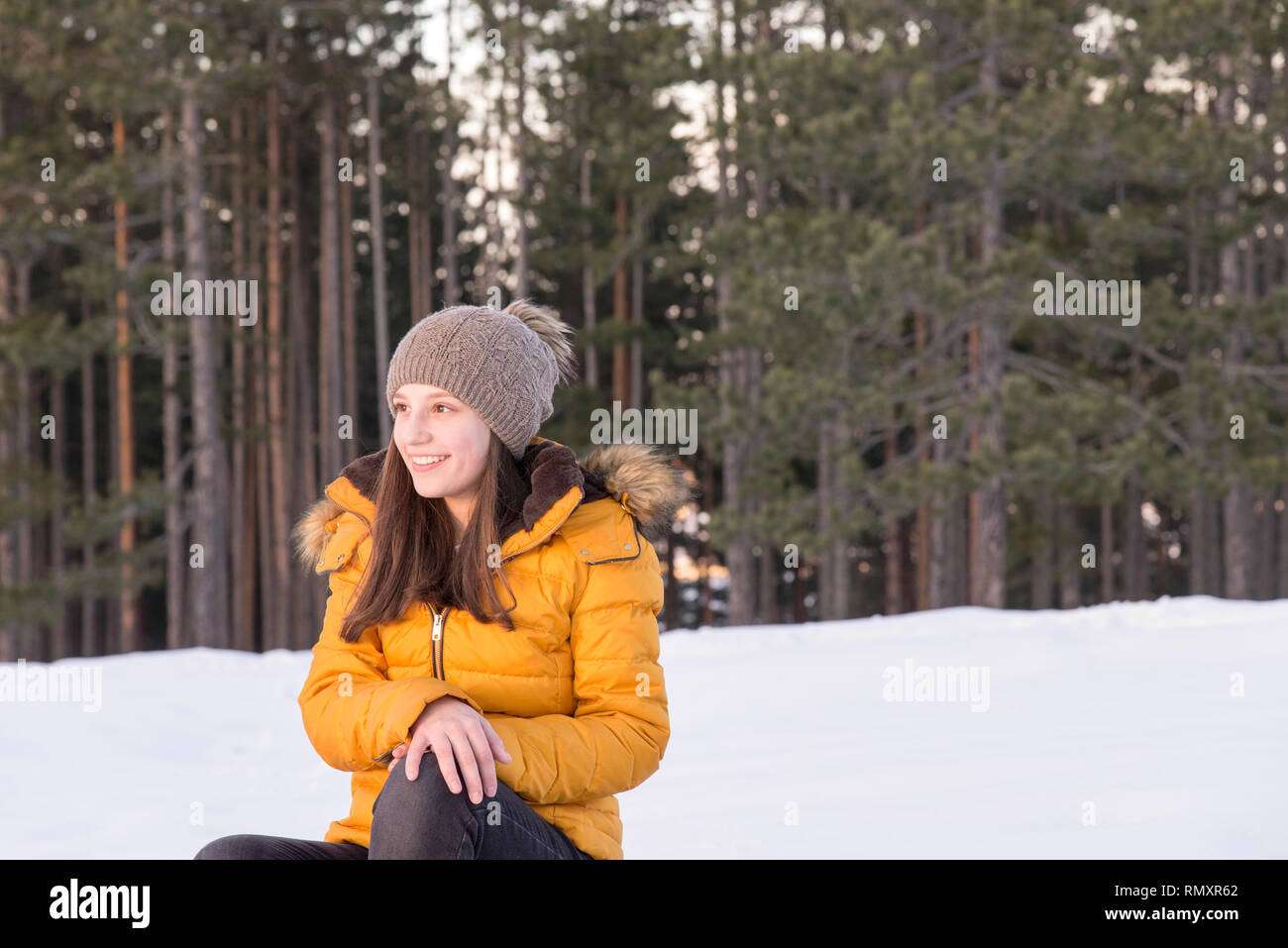 Beautiful girl modeling on snow Stock Photo - Alamy